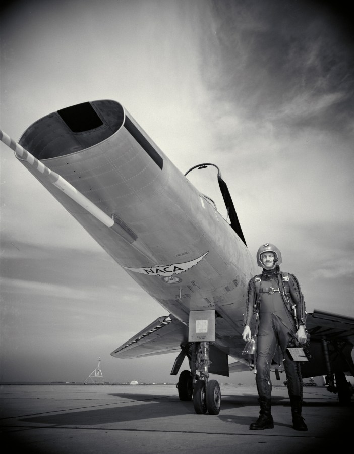 NACA Test Pilot Poses with Plane | New Space Economy